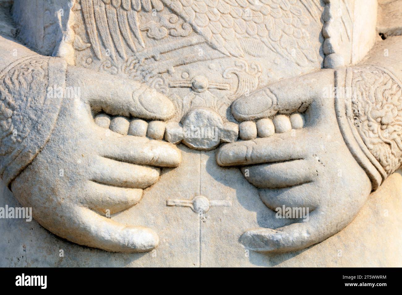 Chinese ancient stone carvings arm Stock Photo - Alamy