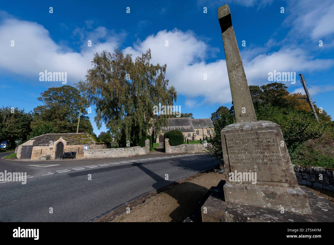 Chollerton War Memorial and Chollerton Stable and Hearse House in view ...