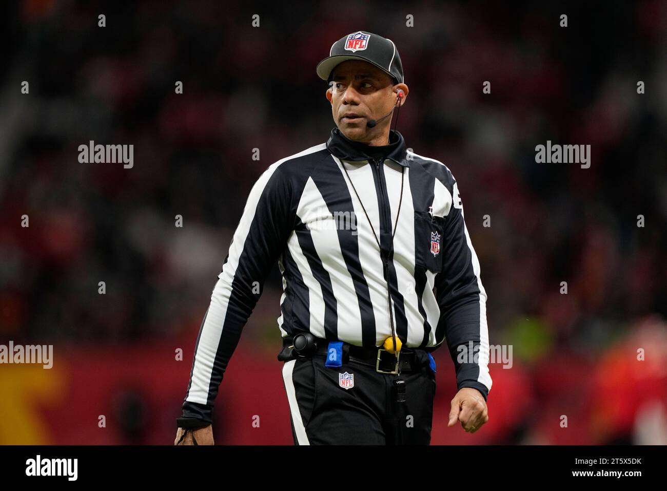 Line judge Greg Bradley (98) walks on the field during an NFL football ...