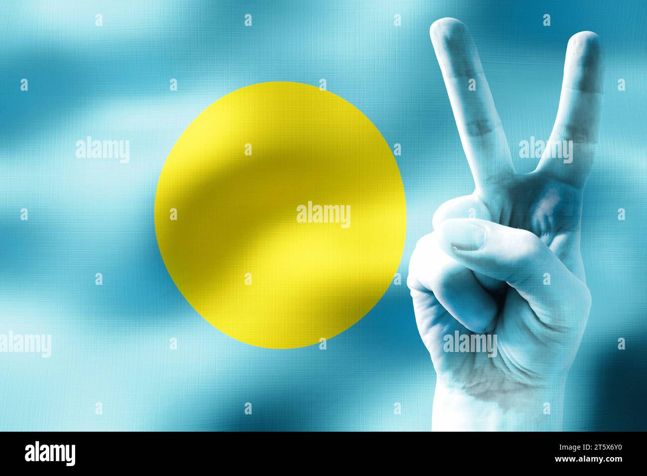 Palau - two fingers showing peace sign and national flag Stock Photo ...
