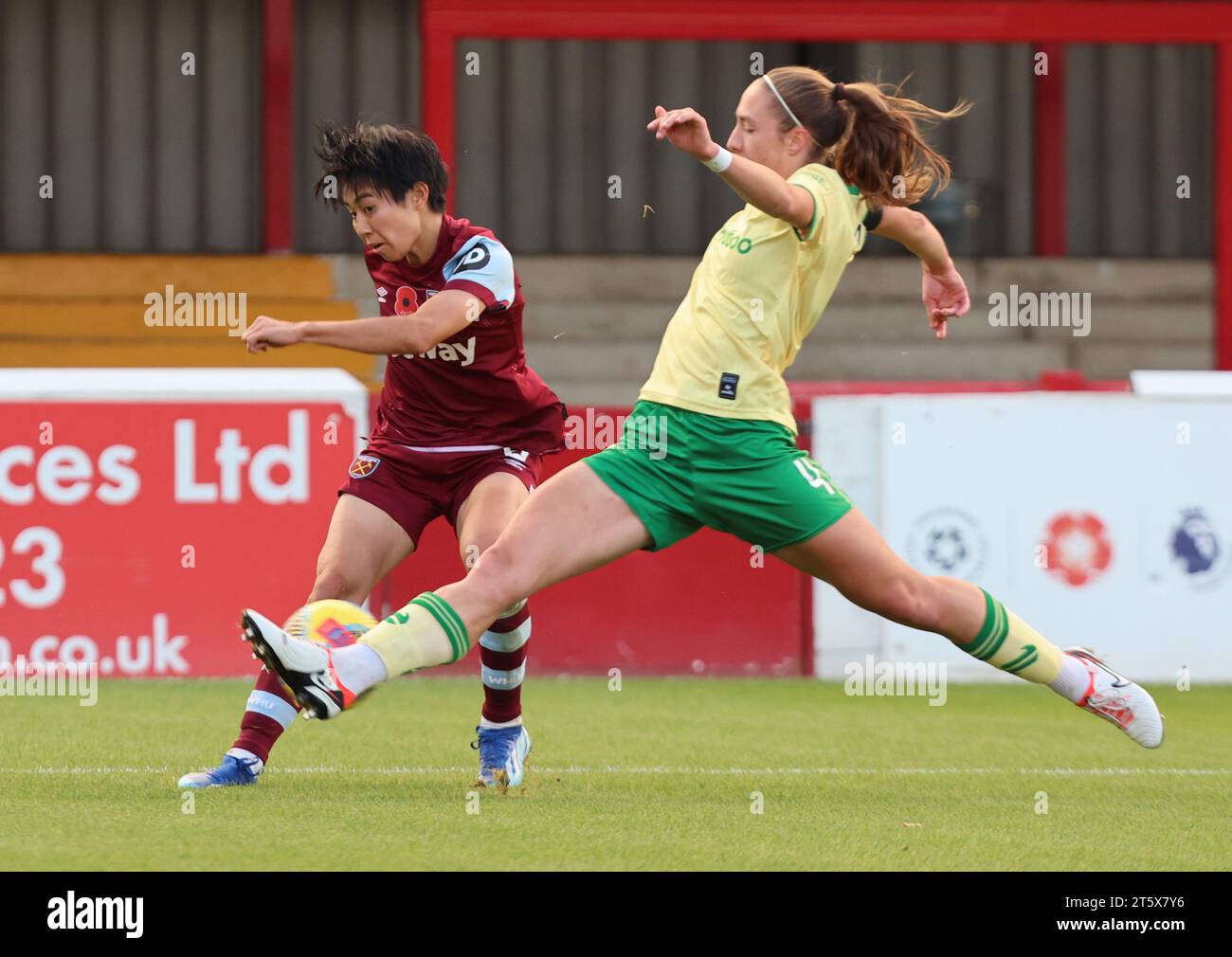 Riko Ueki of West Ham United WFC and Naomi Layzell of Bristol City ...
