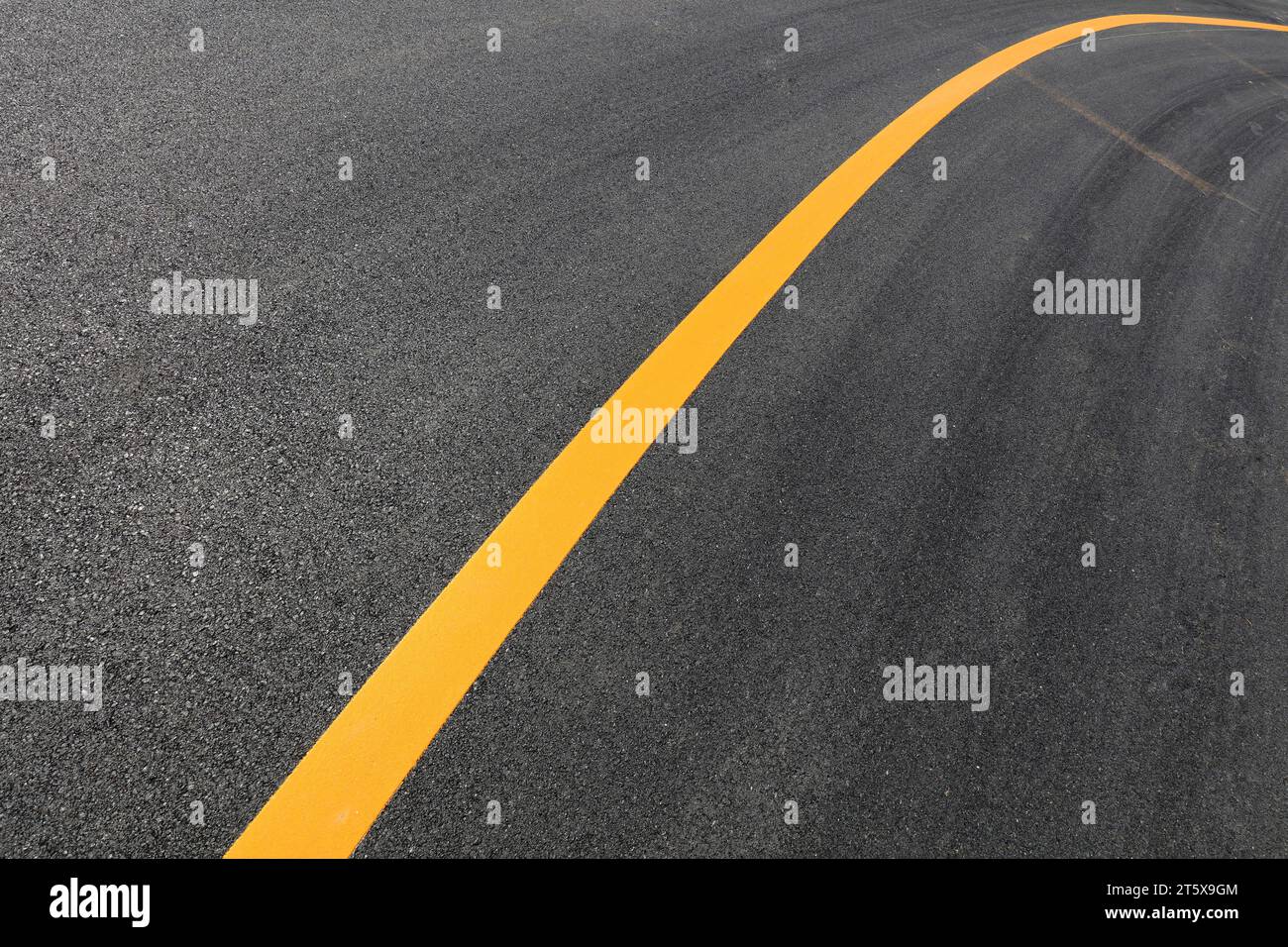 yellow line on the asphalt highway Stock Photo - Alamy