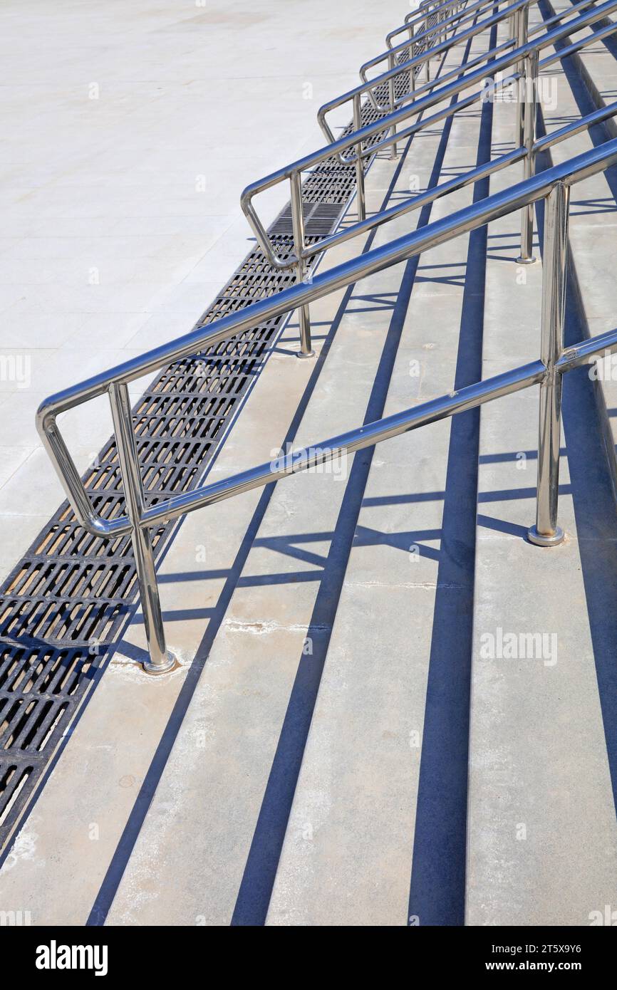 Steps and stainless steel railings Stock Photo - Alamy