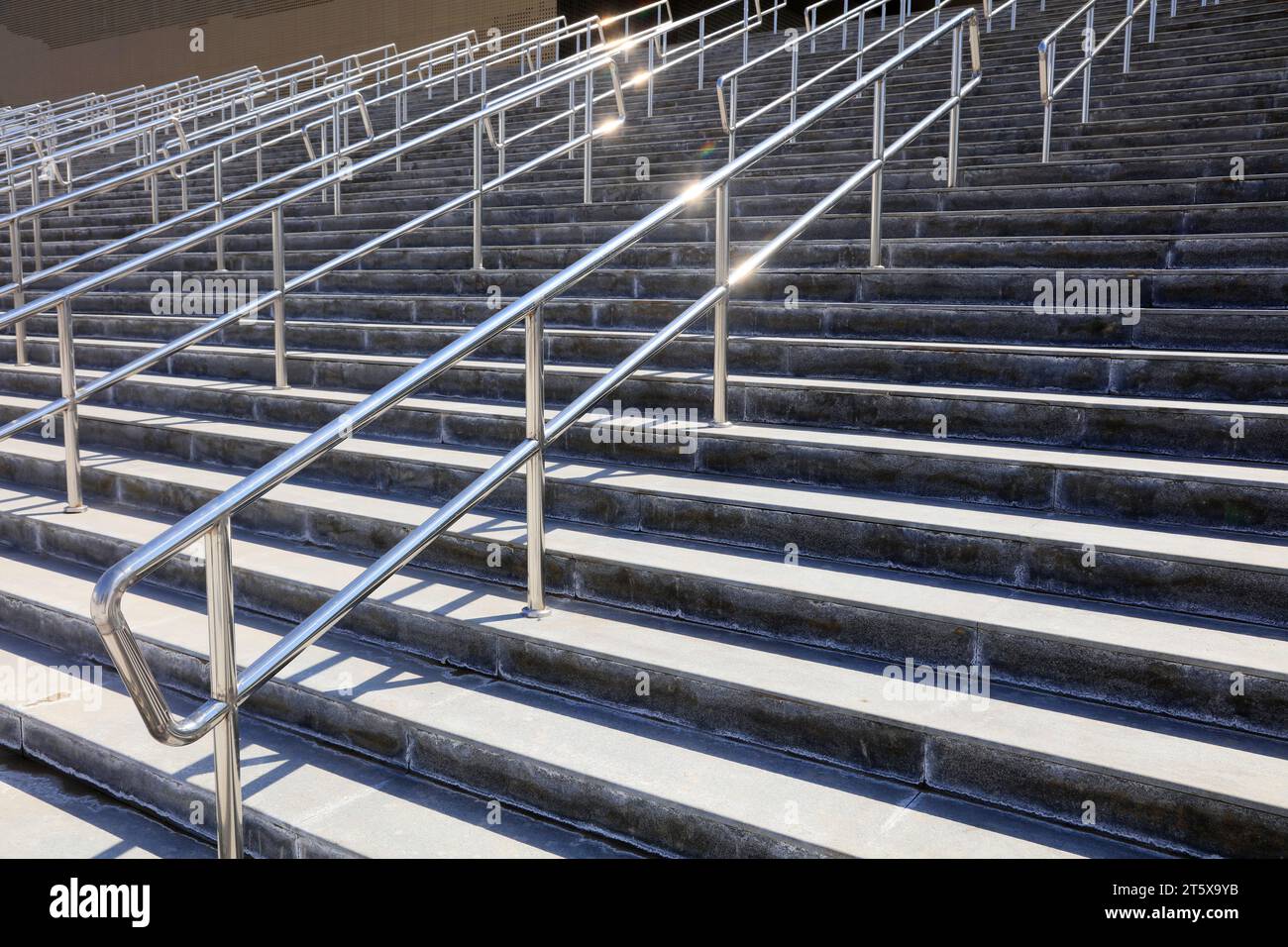 Steps and stainless steel railings Stock Photo - Alamy