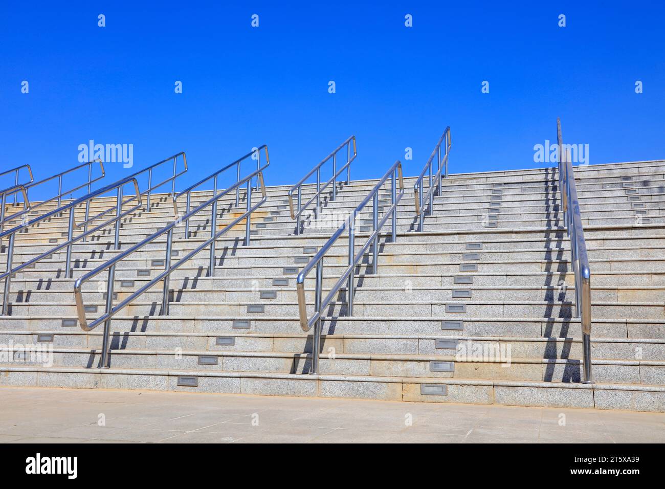 Steps and stainless steel railings Stock Photo - Alamy