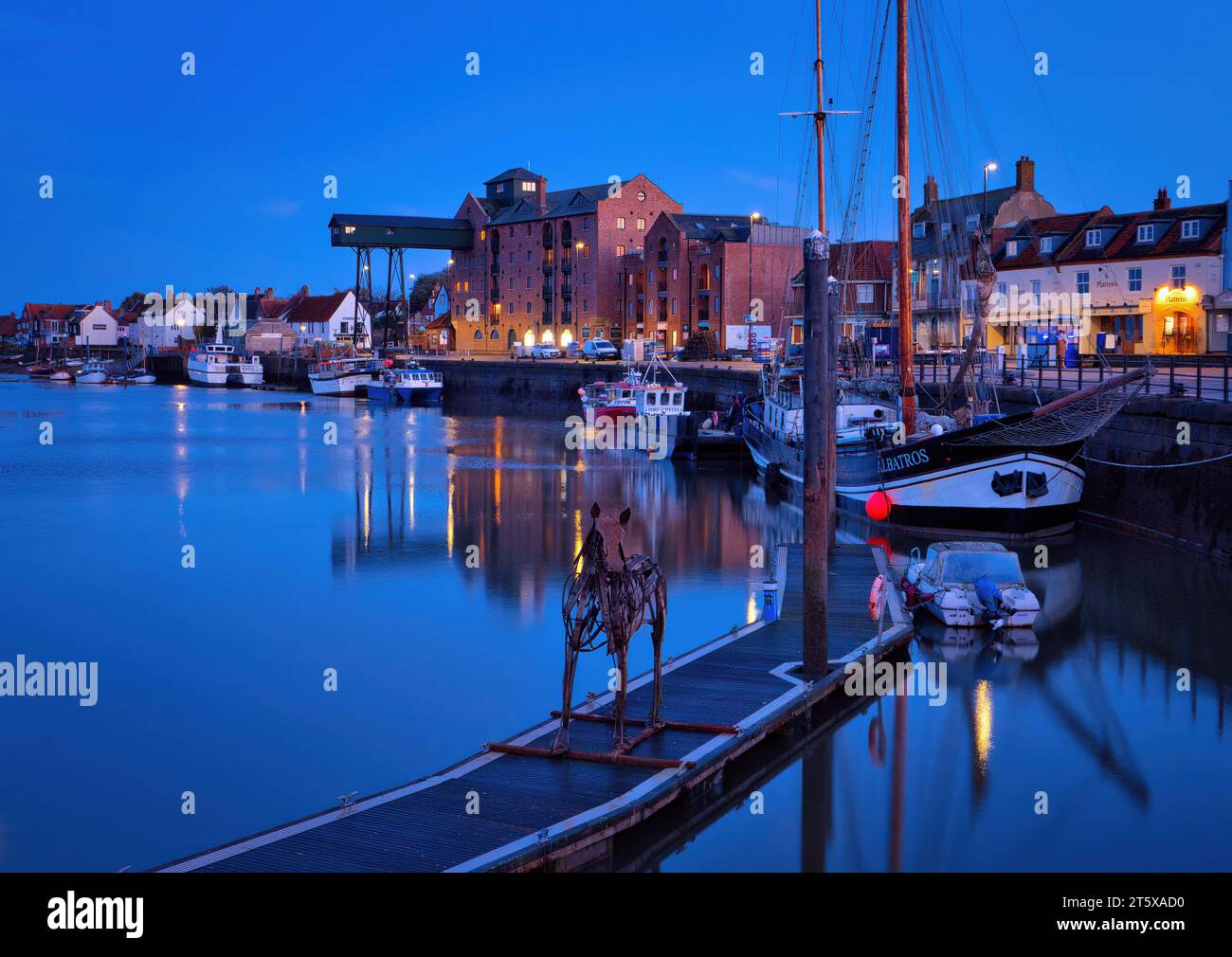 Night falls at Wells Next the Sea quayside on the North Norfolk coast ...