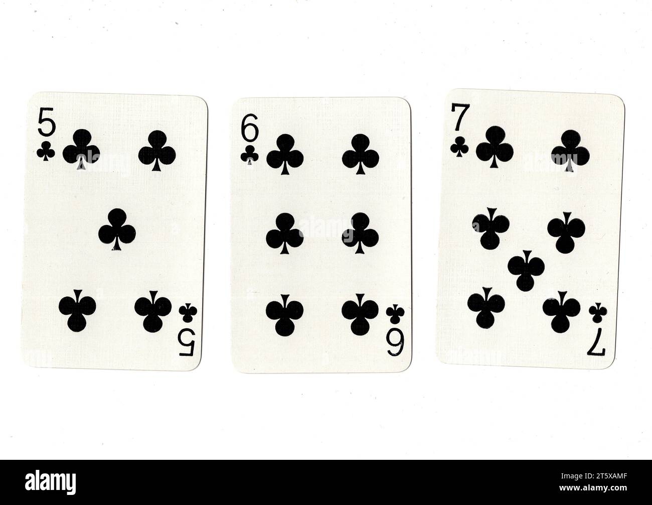A selection of three vintage playing cards showing a run of five, six ...