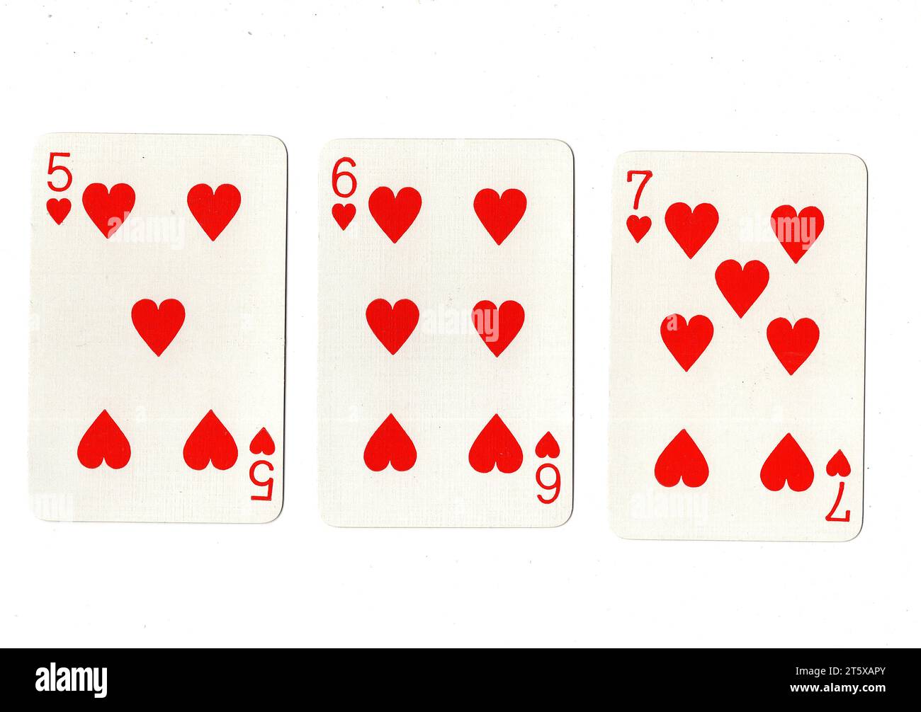 A selection of three vintage playing cards showing a run of five, six ...