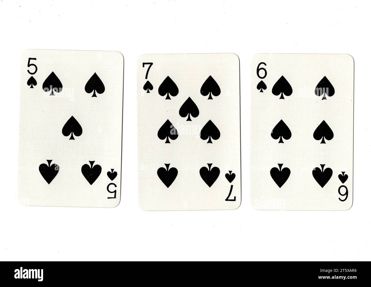 A selection of three vintage playing cards showing five, six and seven ...