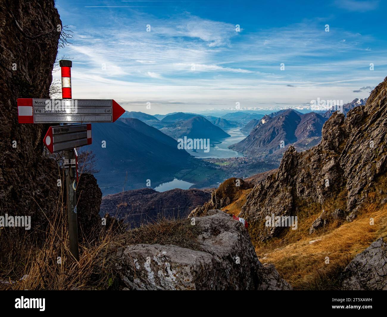 Path signs on a trail in the alps of Lake Como ( the writes on the ...