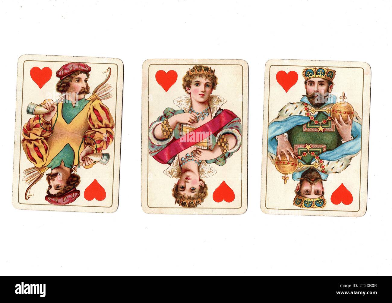 Three antique playing cards showing a jack, queen and king of hearts on ...