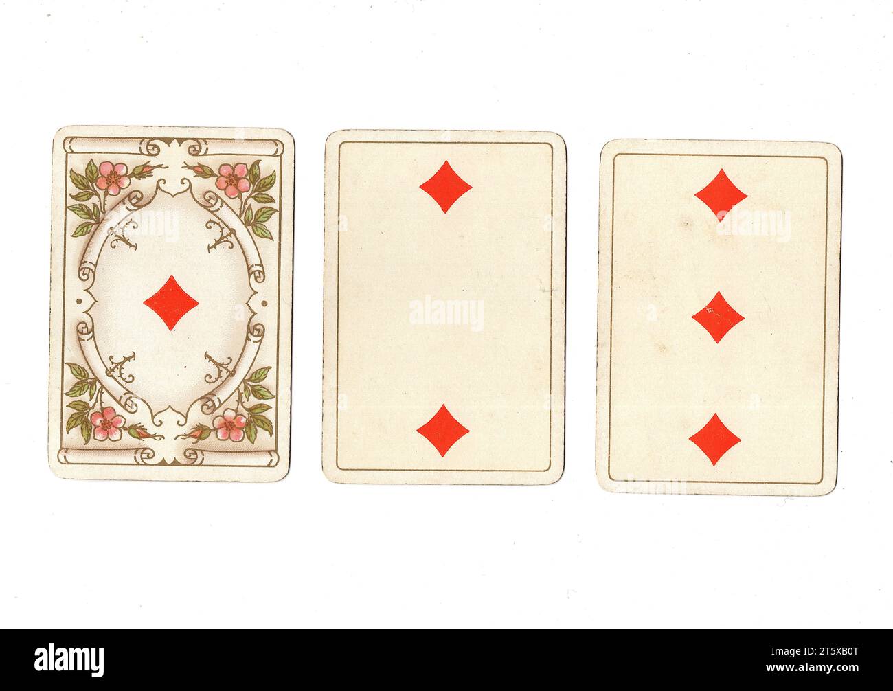 Three antique playing cards showing an ace, two and three of diamonds ...
