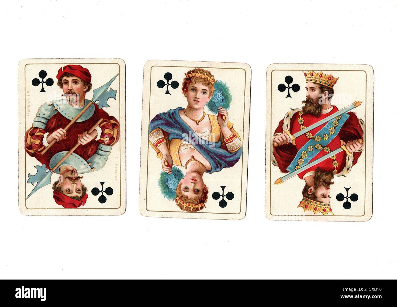 Three antique playing cards showing a jack, queen and king of clubs on ...