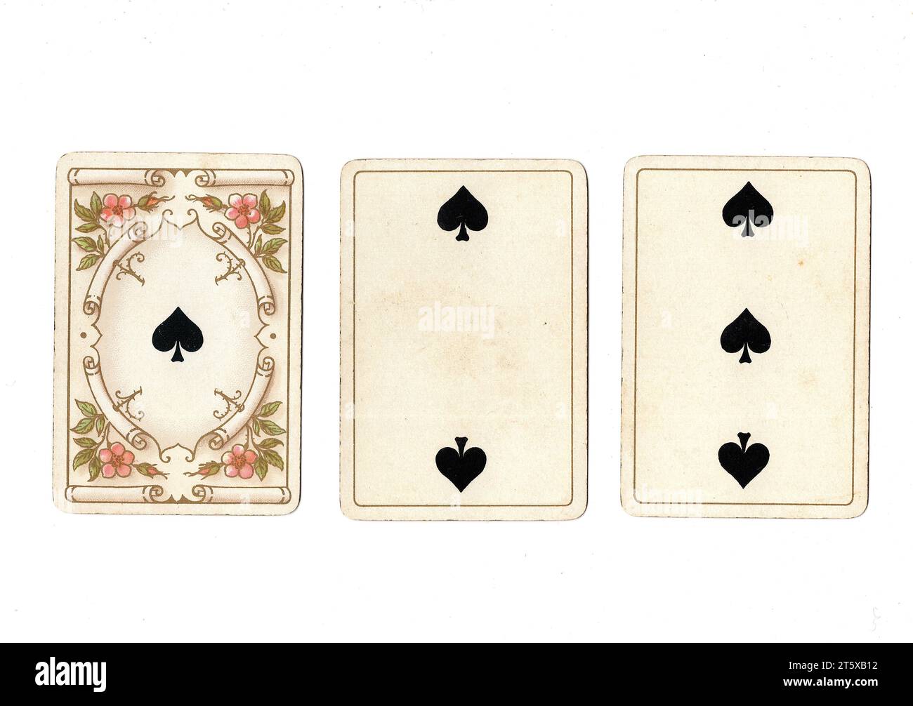 Three antique playing cards showing an ace, two and three of spades on ...