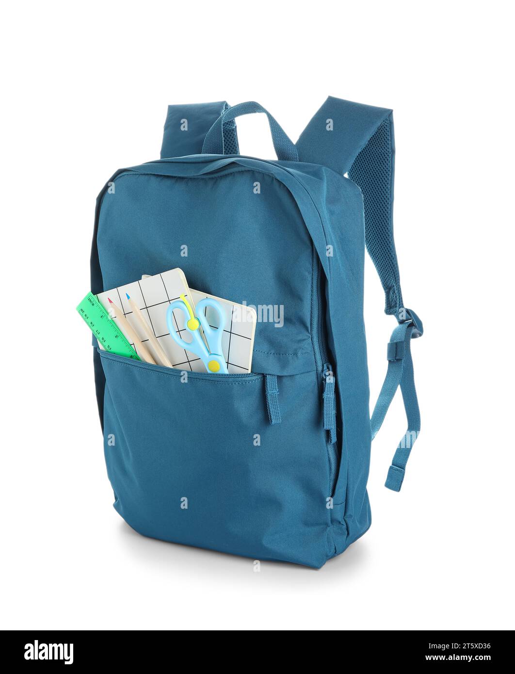 Stylish blue school backpack with different stationery supplies on ...