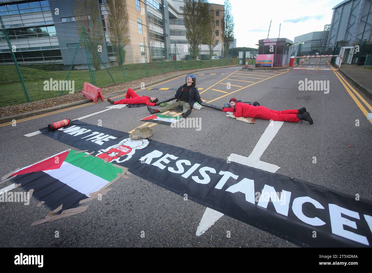 Three activists, joined together with a series of metal lock-on chant ...