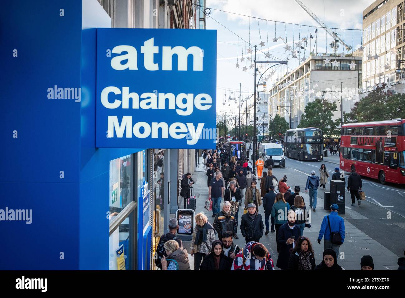 LONDON, OCTOBER 6, 2023: Elevated view of ATM money exchange store and ...