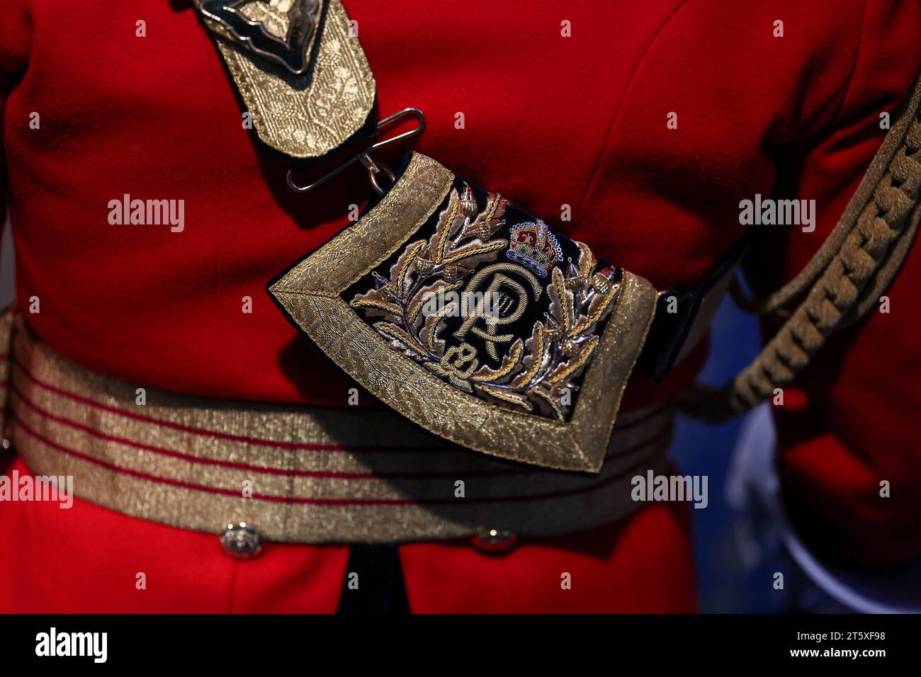 The royal cypher of King Charles III is seen on the uniform of a member ...
