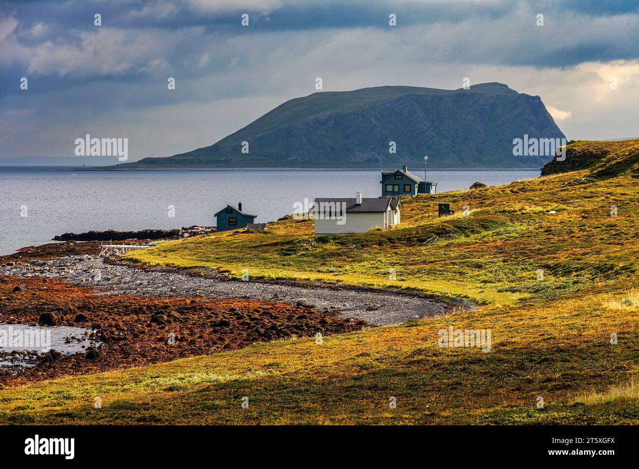 Isolated houses on the strait between the island of Magerøya and the ...