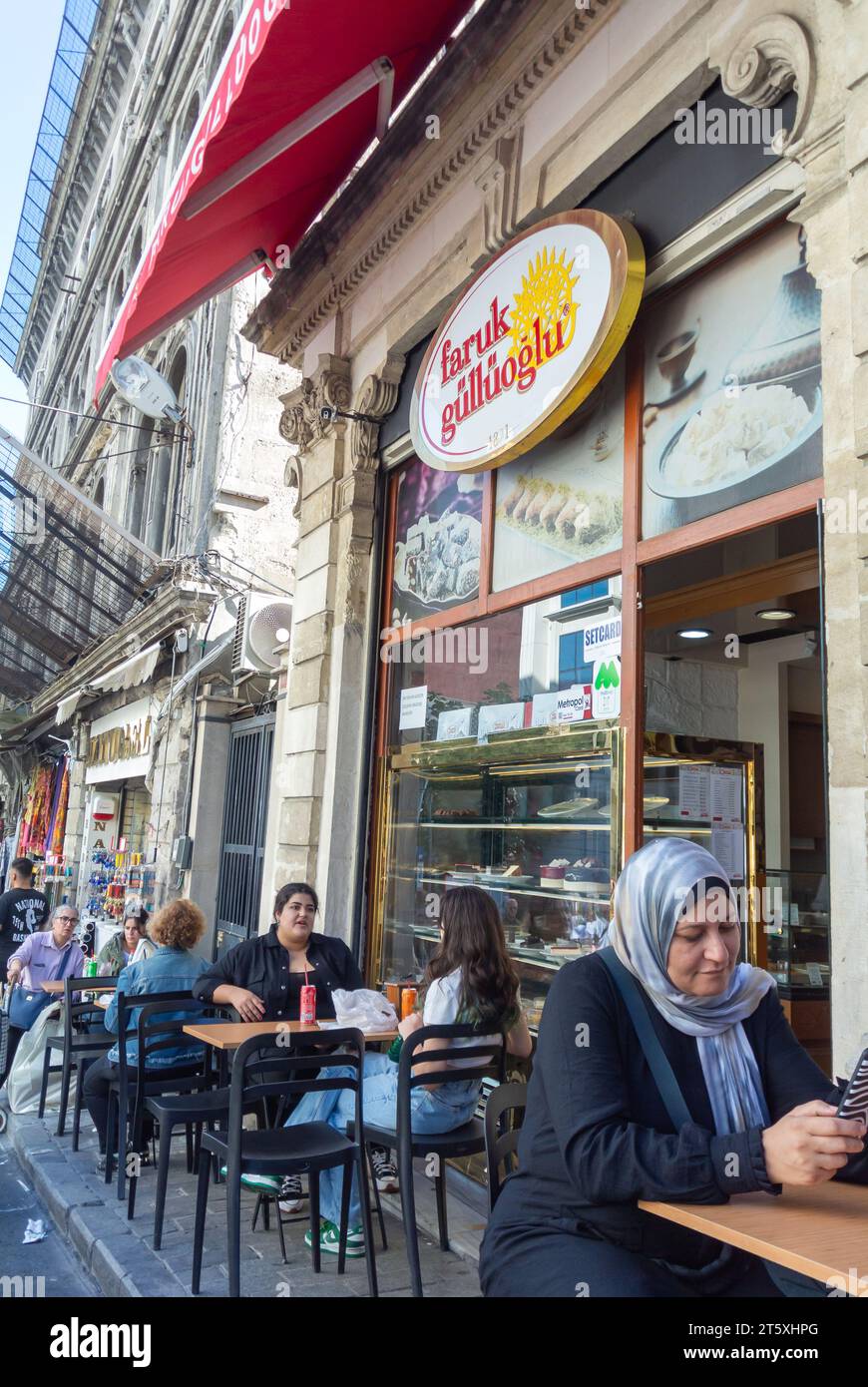 Istanbul, Turkey, Turkish people at a terrace of cafe in the street ...
