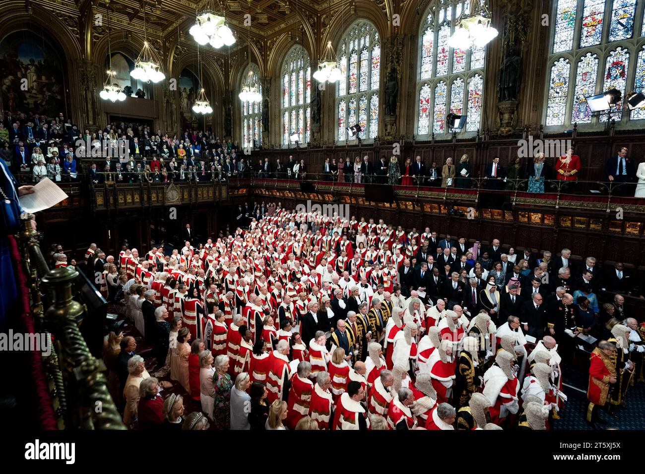 Members of the House of Lords stand during the State Opening of ...