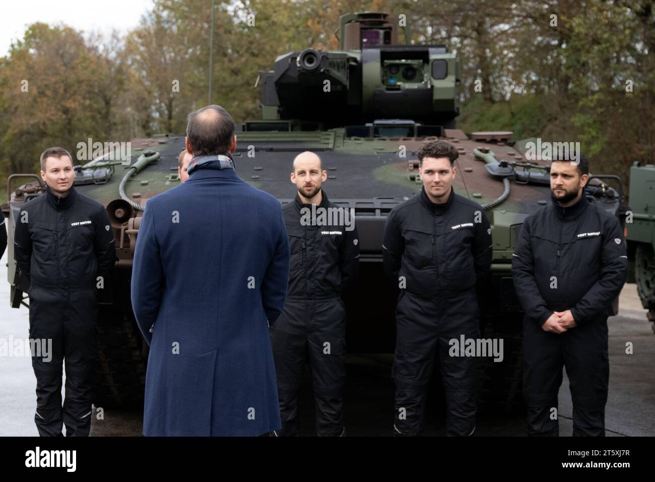 Munich, Germany. 07th Nov, 2023. Haakon (v), Crown Prince of Norway, talks to employees on the ...