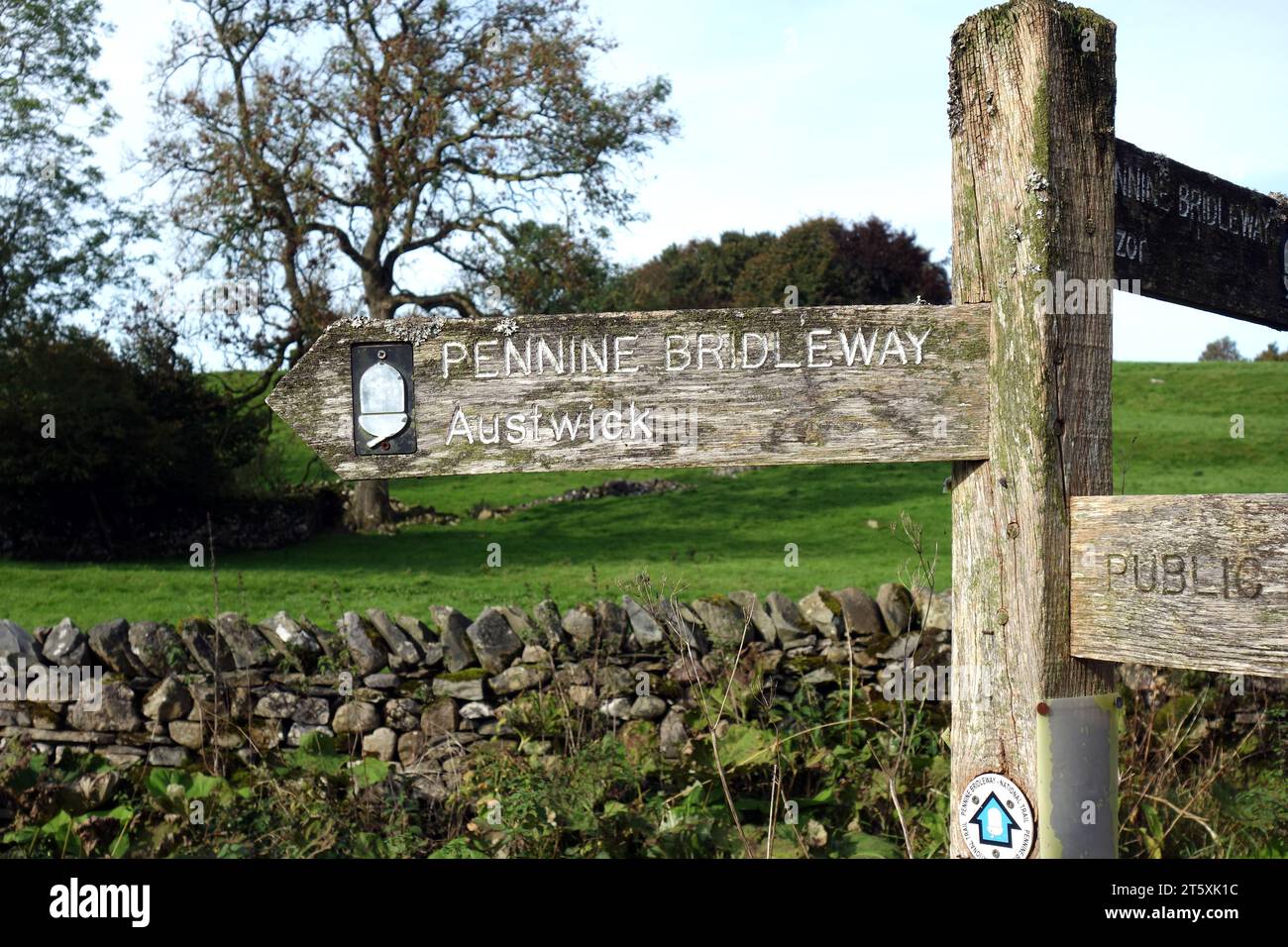 Wooden Signpost for Pennine Bridleway to Auswick from Feizor in the ...