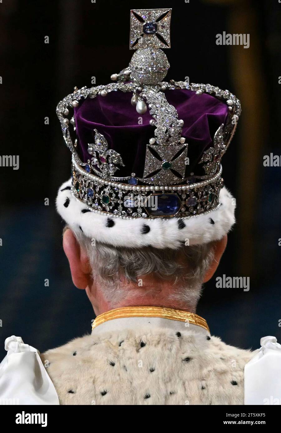 Britain's King Charles III, wearing the Imperial State Crown and the ...