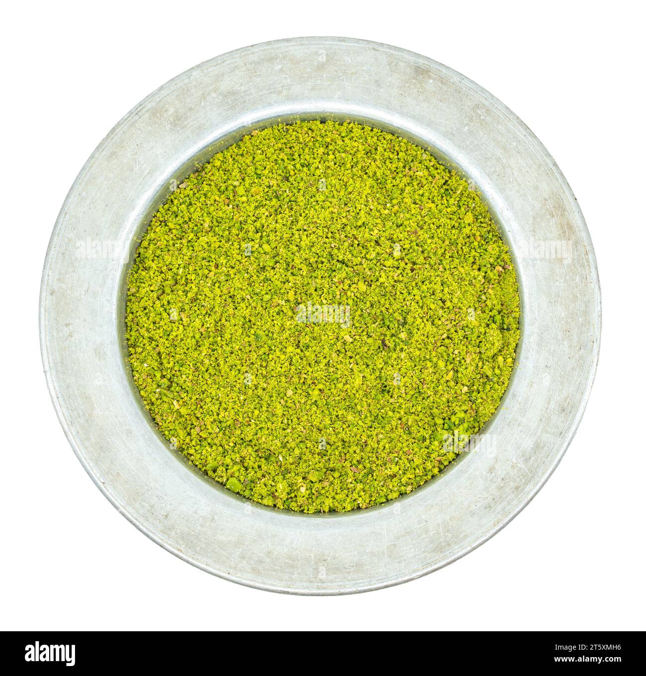 Italian or Turkish Pistachio powder pile with pistachios in the bowl or ...