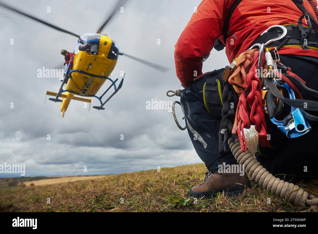 Selective focus on safety harness of paramedic of emergency service in ...