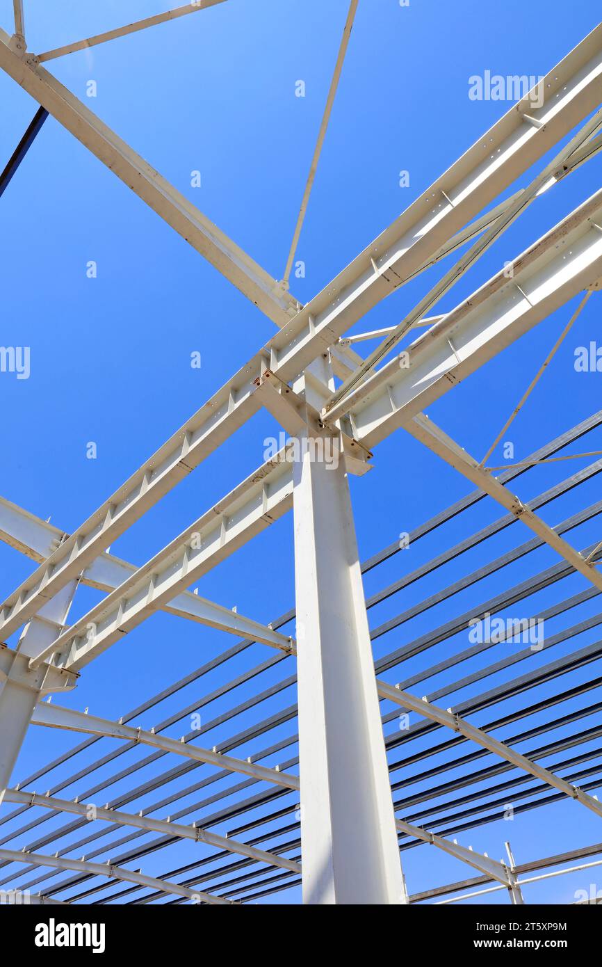 steel girder truss under blue sky, closeup of photo Stock Photo - Alamy