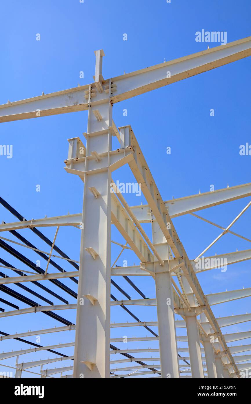 steel girder truss under blue sky, closeup of photo Stock Photo - Alamy
