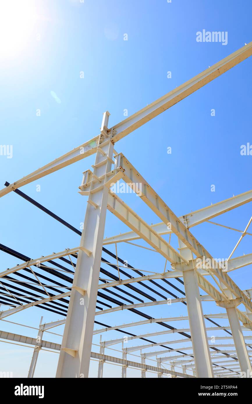 steel girder truss under blue sky, closeup of photo Stock Photo - Alamy