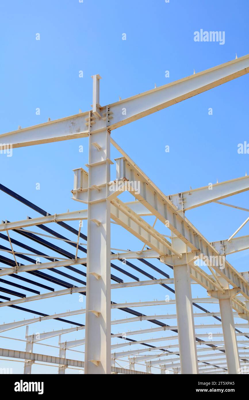 steel girder truss under blue sky, closeup of photo Stock Photo - Alamy