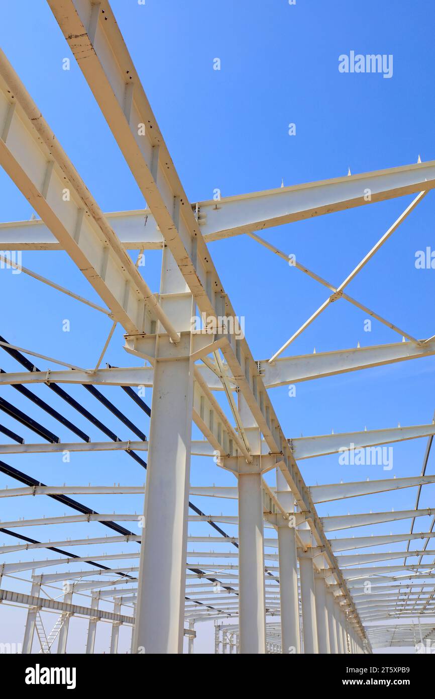 steel girder truss under blue sky, closeup of photo Stock Photo - Alamy