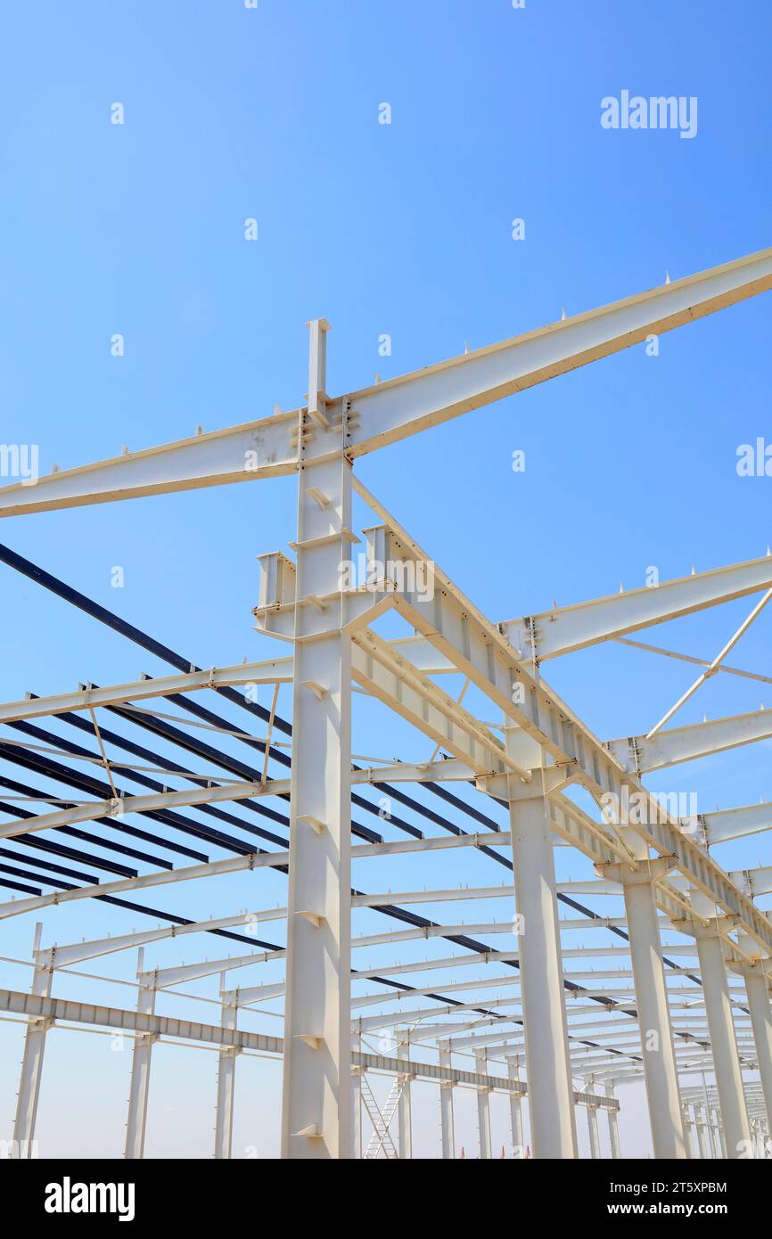 steel girder truss under blue sky, closeup of photo Stock Photo - Alamy