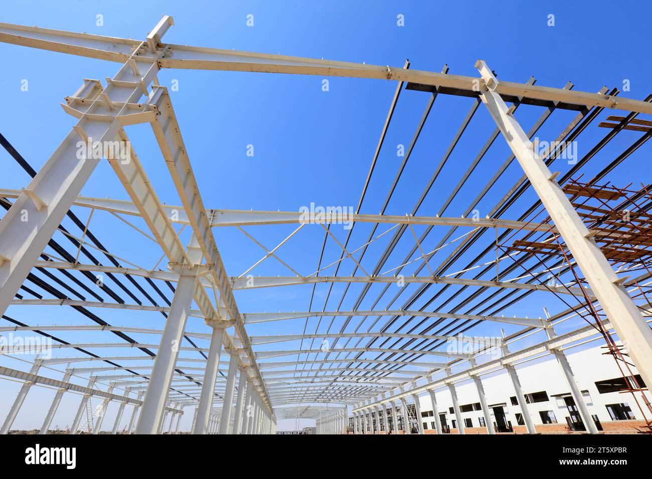 steel girder truss under blue sky, closeup of photo Stock Photo - Alamy