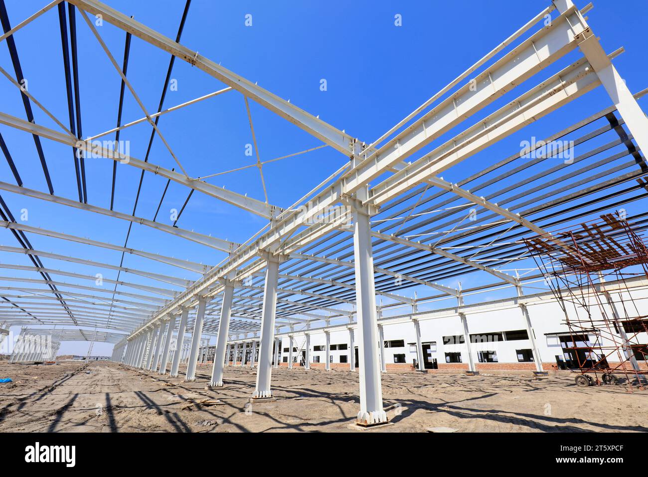 steel girder truss under blue sky, closeup of photo Stock Photo - Alamy