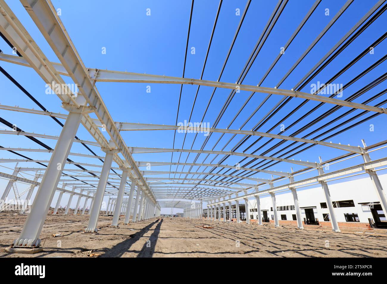 steel girder truss under blue sky, closeup of photo Stock Photo - Alamy