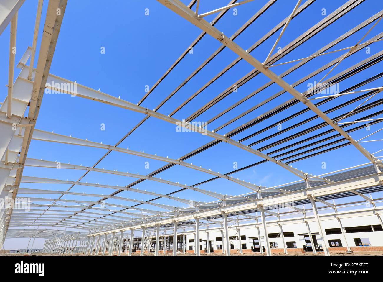 steel girder truss under blue sky, closeup of photo Stock Photo - Alamy