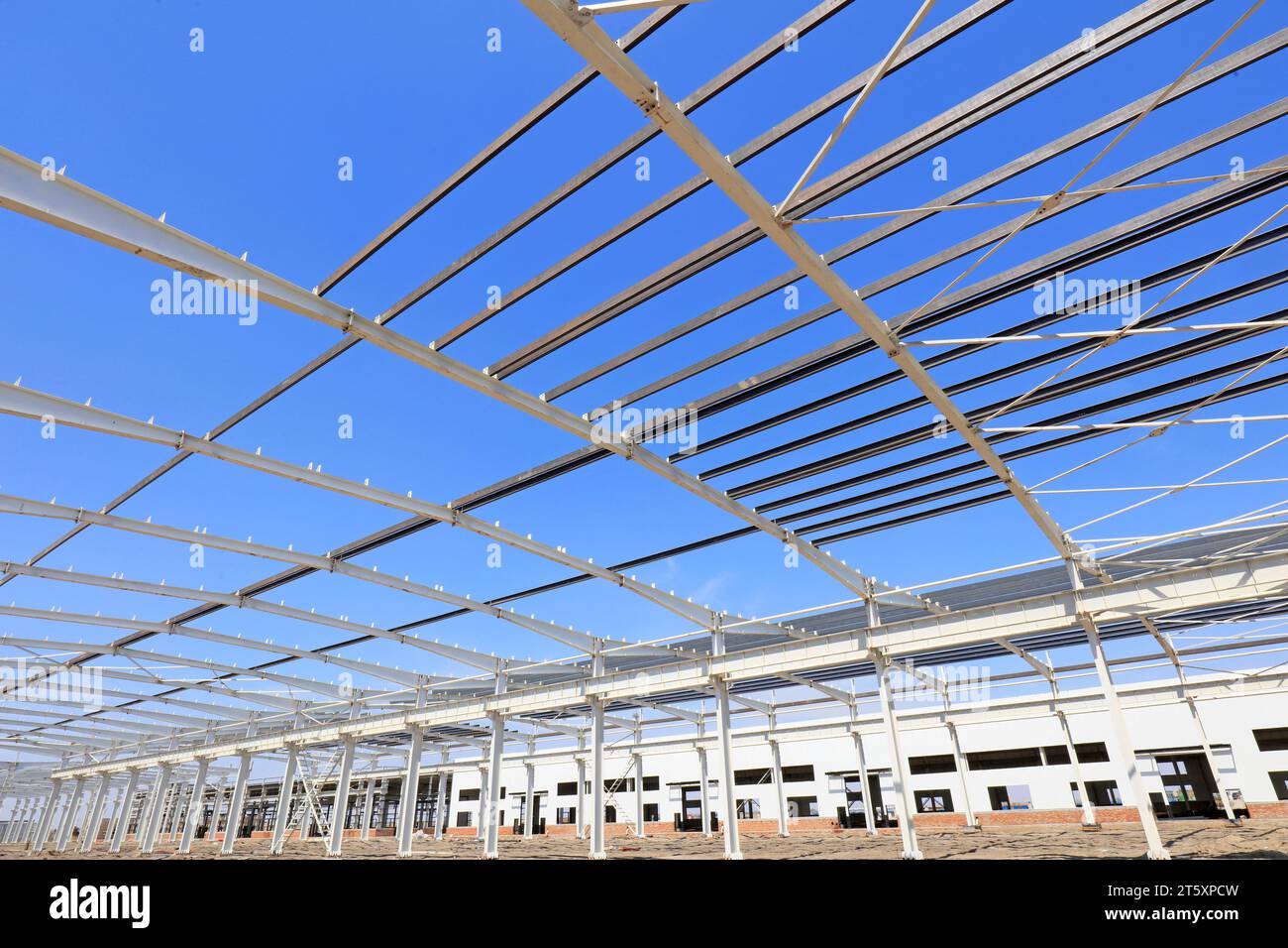 steel girder truss under blue sky, closeup of photo Stock Photo - Alamy