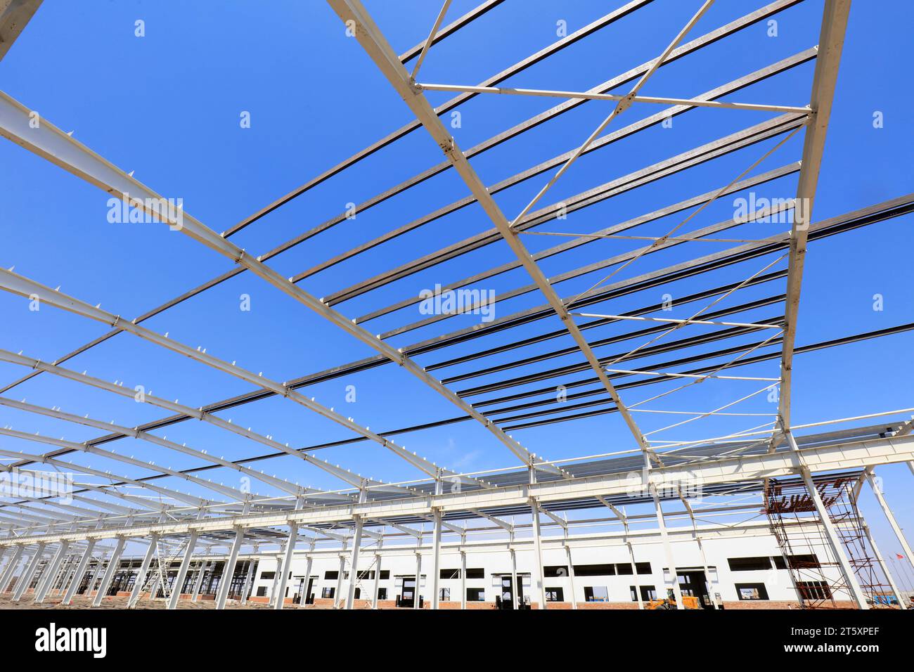 steel girder truss under blue sky, closeup of photo Stock Photo - Alamy