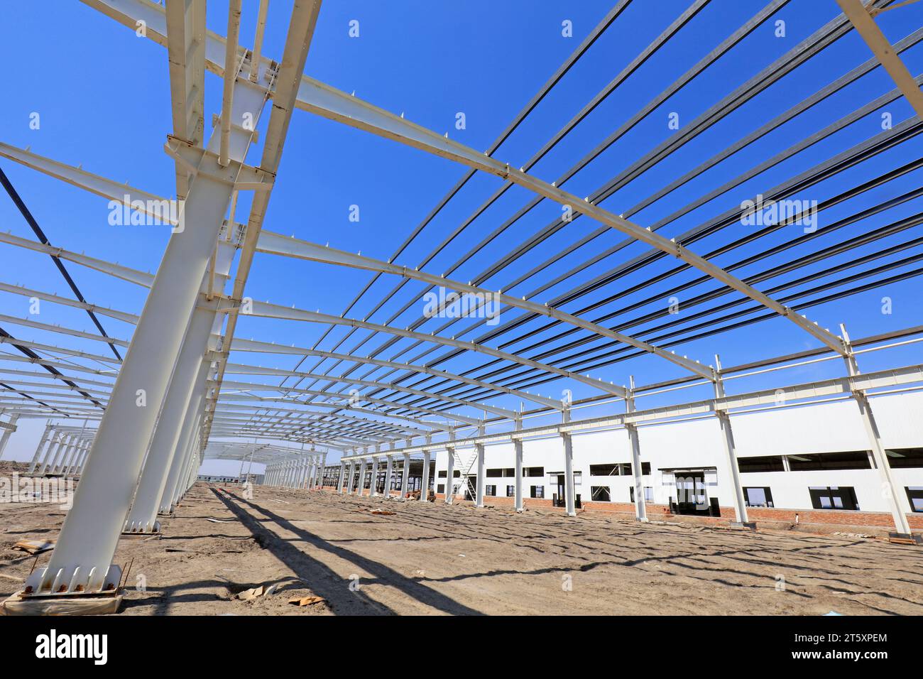 steel girder truss under blue sky, closeup of photo Stock Photo - Alamy