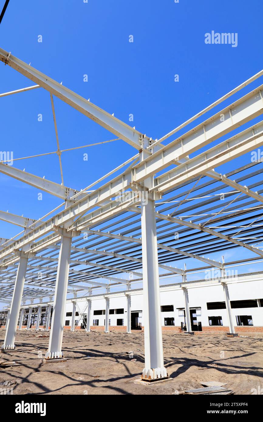 steel girder truss under blue sky, closeup of photo Stock Photo - Alamy