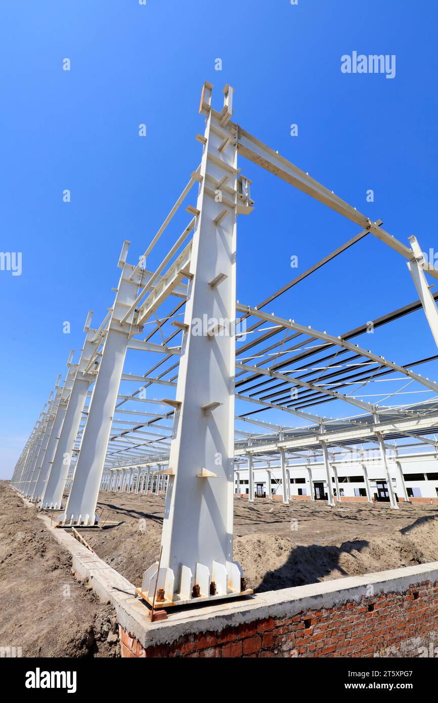 steel girder truss under blue sky, closeup of photo Stock Photo - Alamy