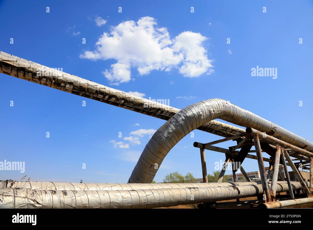 Thermal insulation pipe under blue sky Stock Photo - Alamy