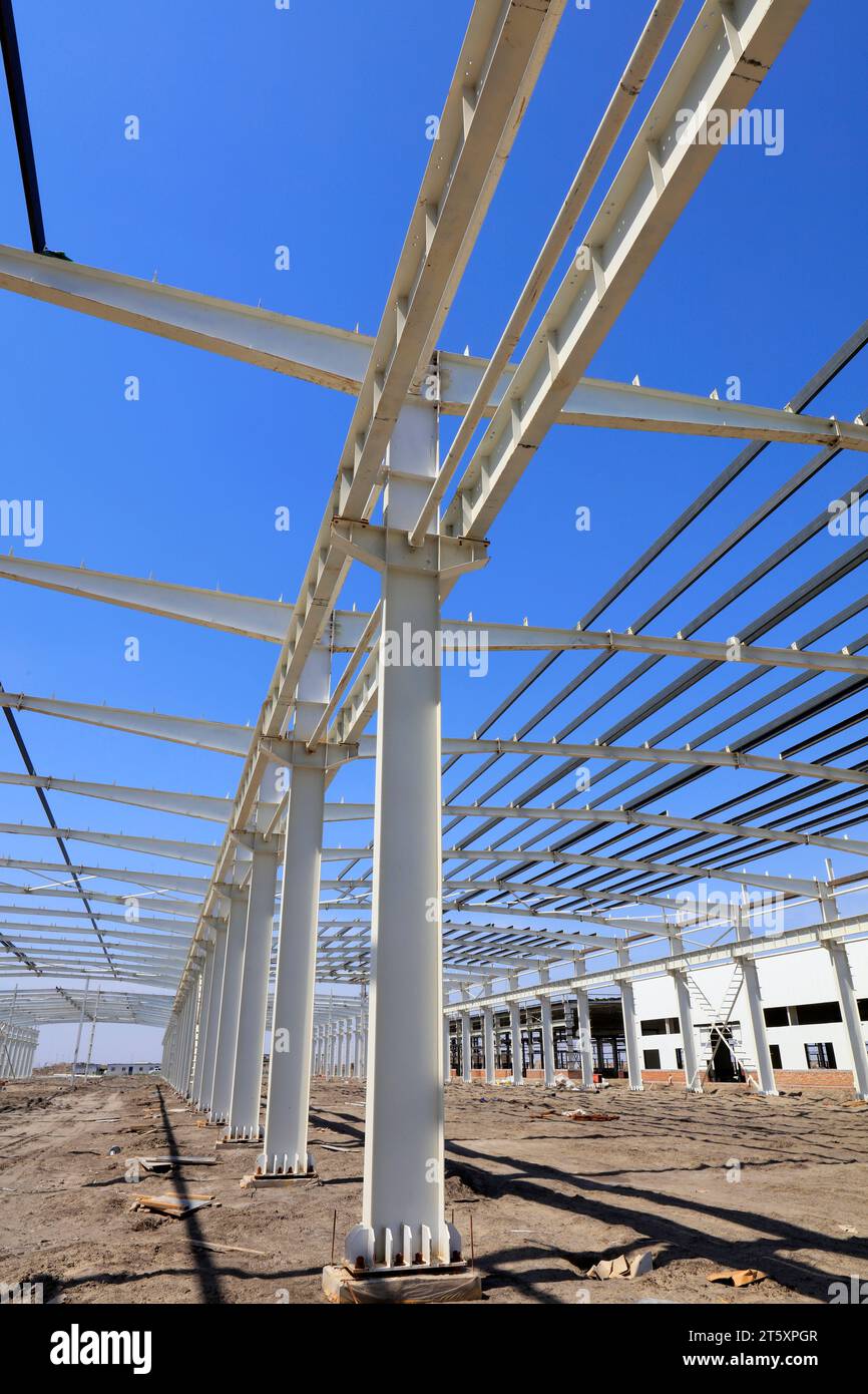 steel girder truss under blue sky, closeup of photo Stock Photo - Alamy