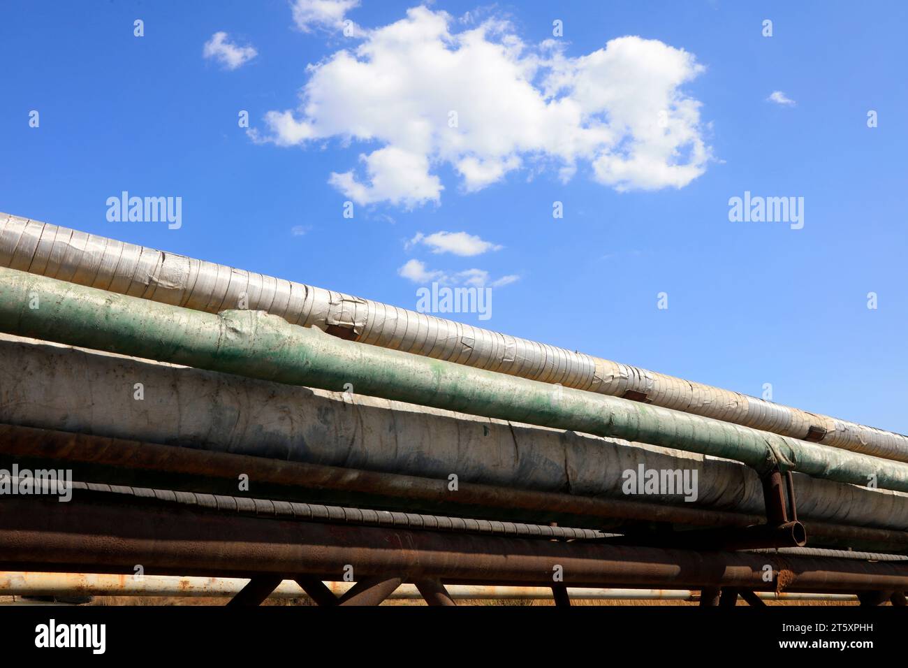 Thermal insulation pipe under blue sky Stock Photo - Alamy
