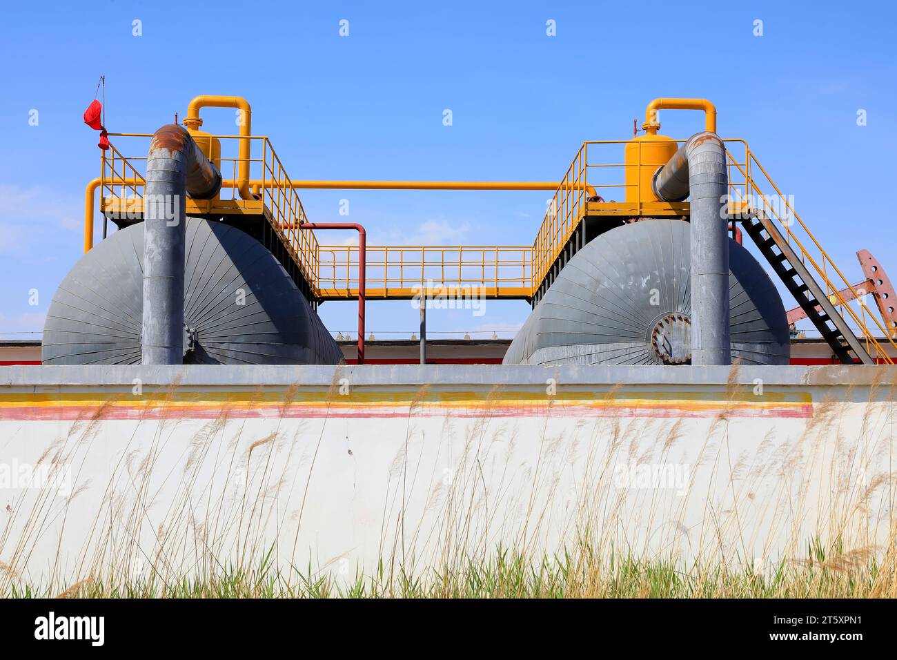 Storage tanks in a factory Stock Photo - Alamy