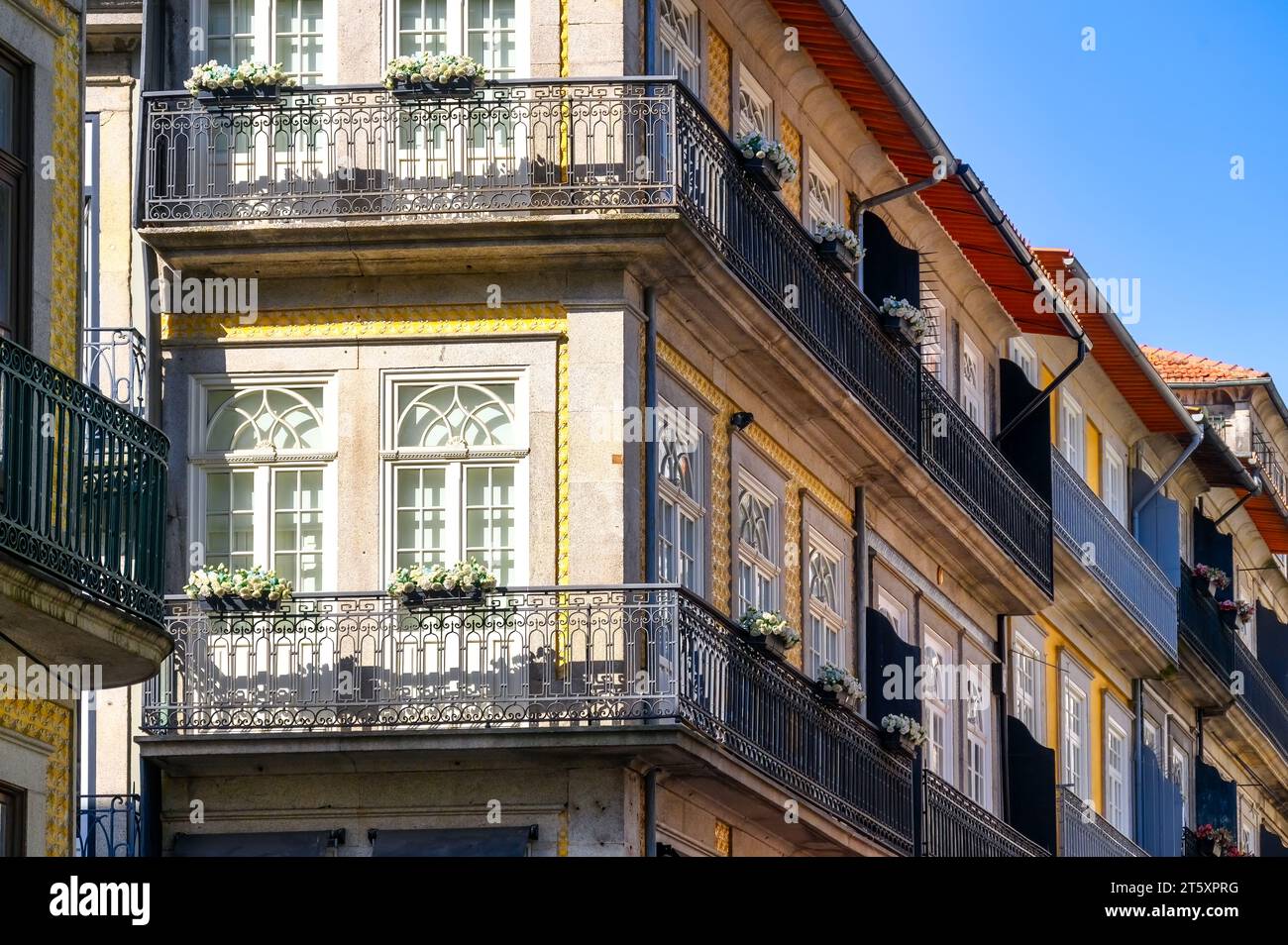 Porto, Portugal, window and balcony in the facade of old traditional ...